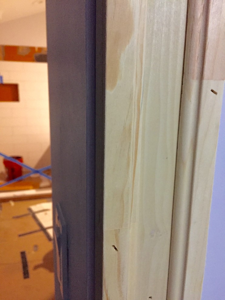 Entry way trim not flush with wall?