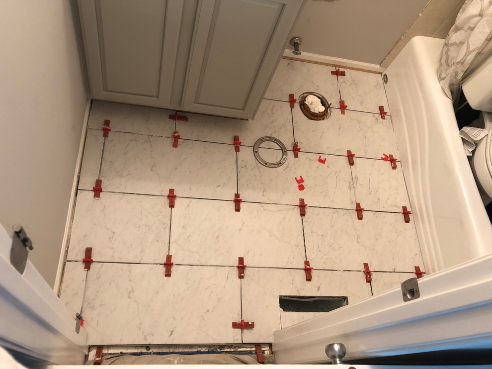 Bathroom tile spacing - even or slivers?