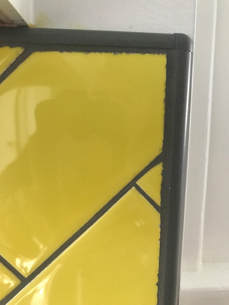 Bad tile backsplash job?