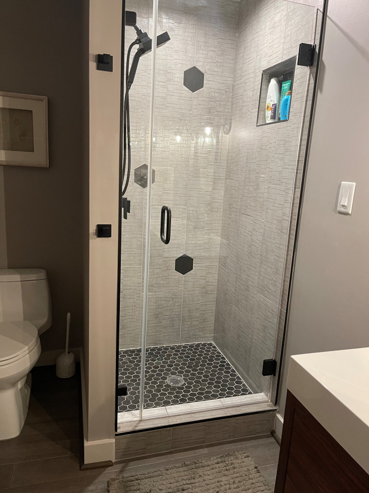 Add solid surface threshold to existing tiled shower curb?