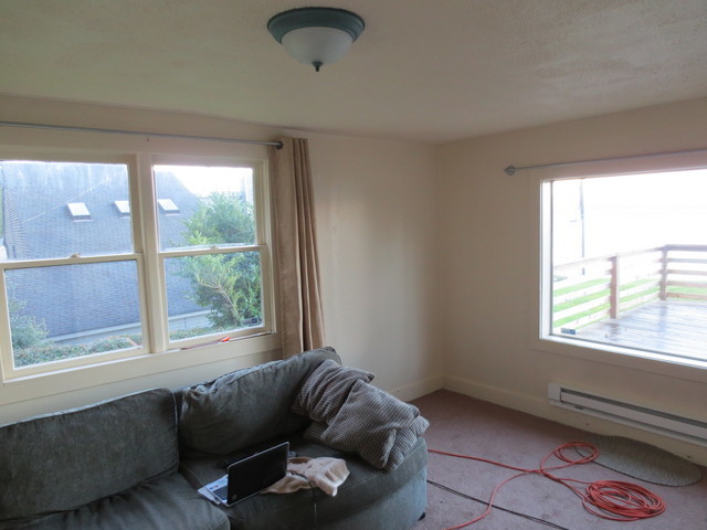 Curtain height with two different height windows?