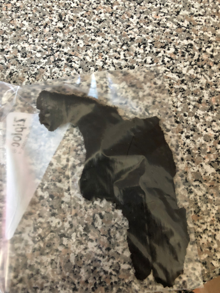 New roof - found pieces of black paper that fell off. Should I worry ...