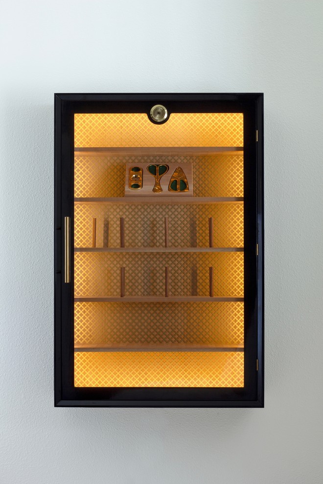 Wall hung high gloss black cigar humidor with polished brass hardware ...