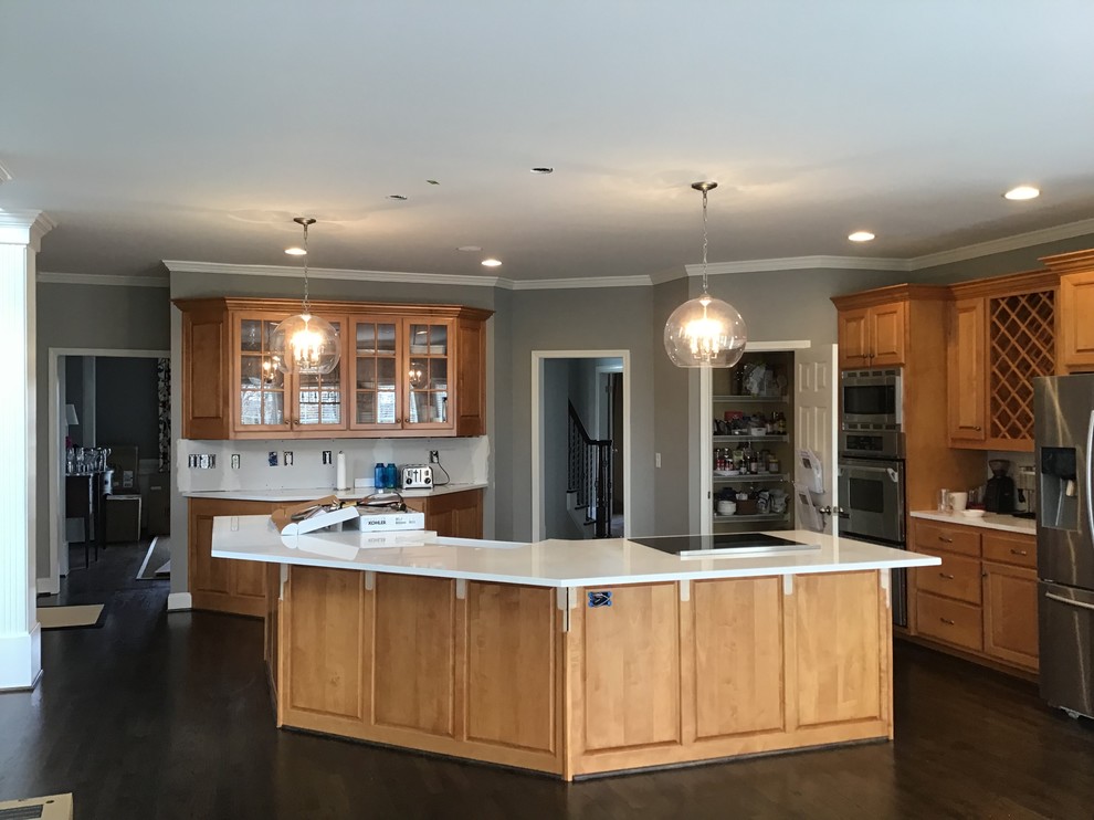 Need advice: 2 large pendants or 3 over large angled island