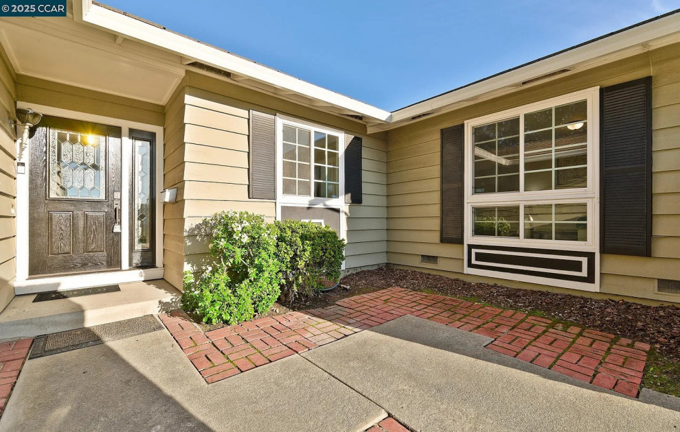 landscape to stop wind tunnel in front patio | Houzz Forum