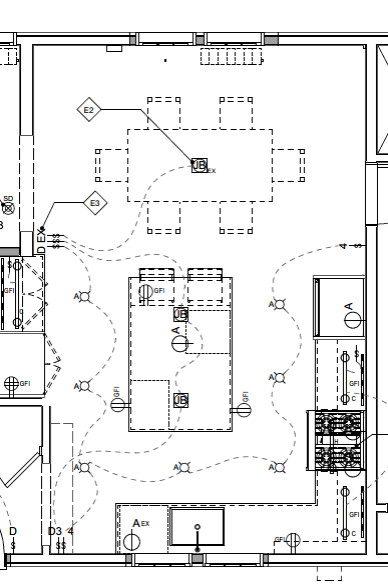 Coordinating hardware, faucet, and lighting finishes in kitchen/dining