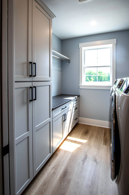 New Build - Laundry Room with Cool Gray Cabinetry and Quartz Countertop ...