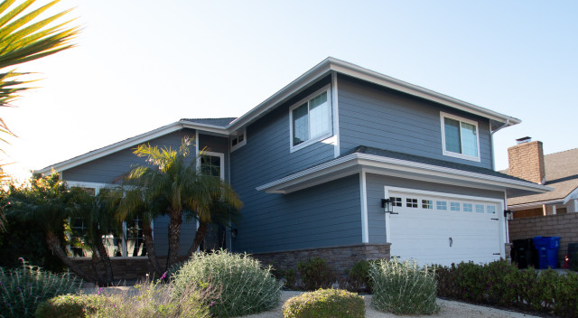 Side View of Home Exterior Siding with Stone Veneer and Hardie Siding ...