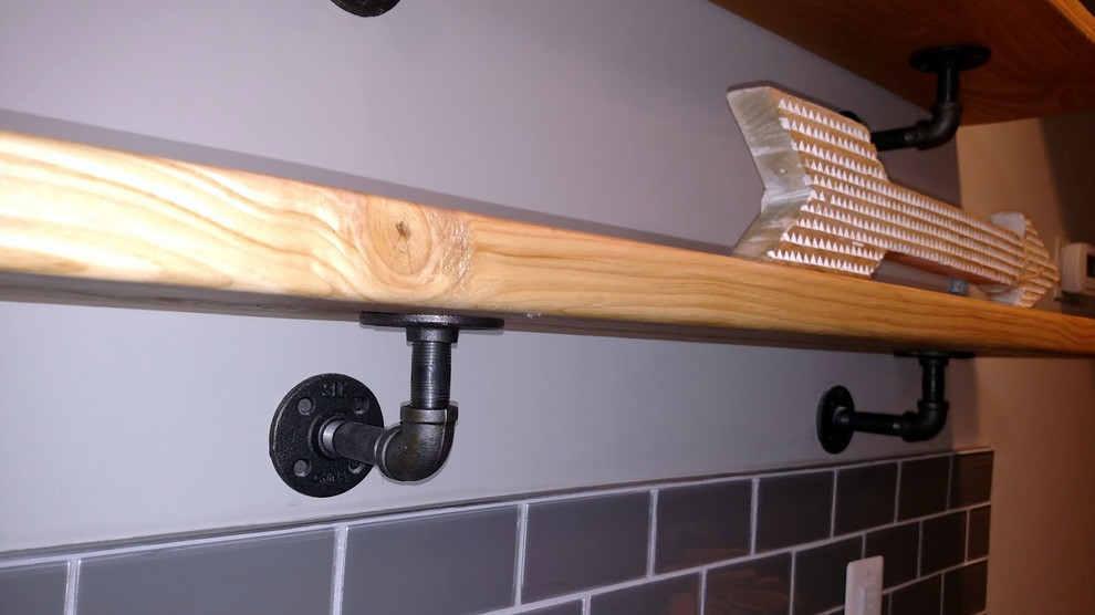 Plumbing pipes as shelf brackets - Industrial - Washington D. C. - de ...
