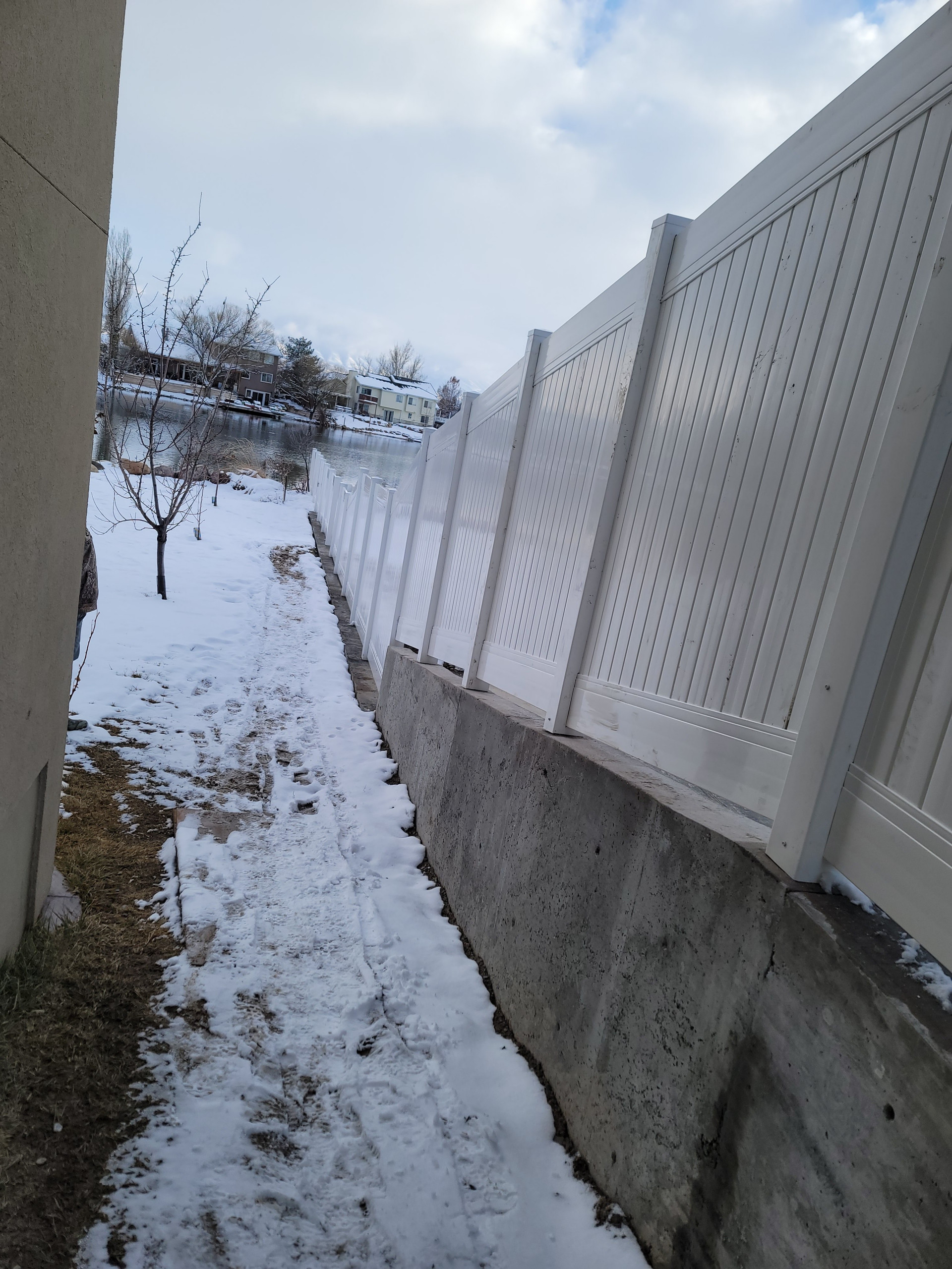 Retaining Wall Leading To Fence Ideas