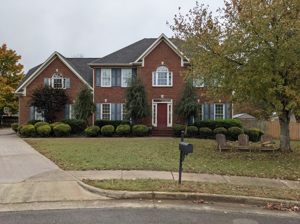 What should guide design style with a generic 1990s suburban brick hom