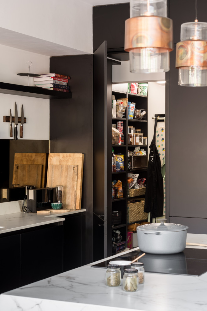 Modern Black Handleless Kitchen With Hidden Pantry and Ceramic Worktops ...
