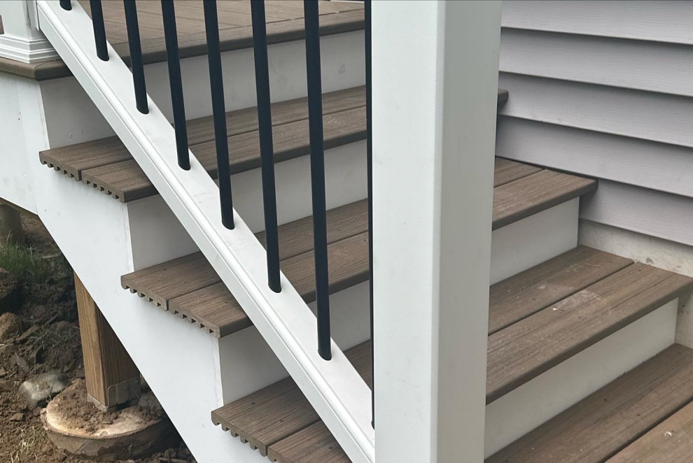 Elevated Tranquility: Deck Oasis with walkway, stairs and fire pit ...