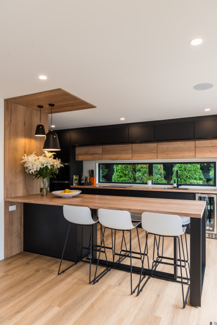 Stunning Black and Wood-Look entertainers kitchen - Contemporary ...