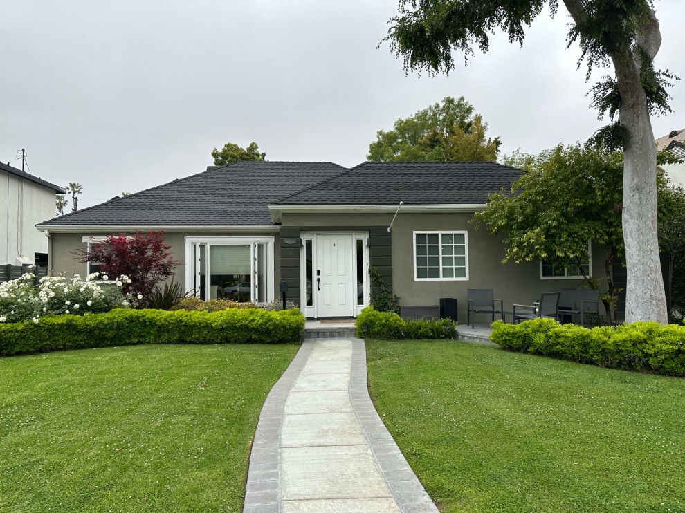 Blending a hip roof with a gable roof addition