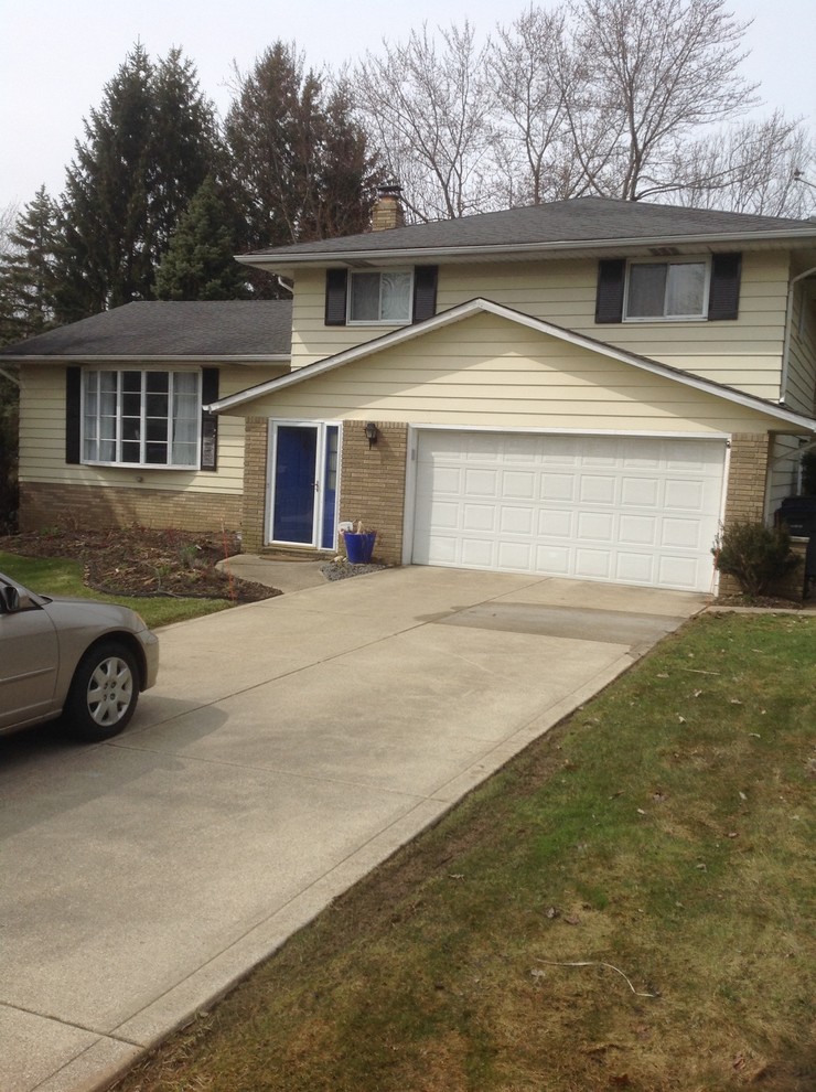 My 1970s split-level home exterior needs help!