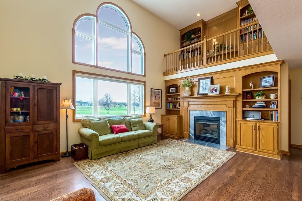 How to make these 2-story windows blend in more