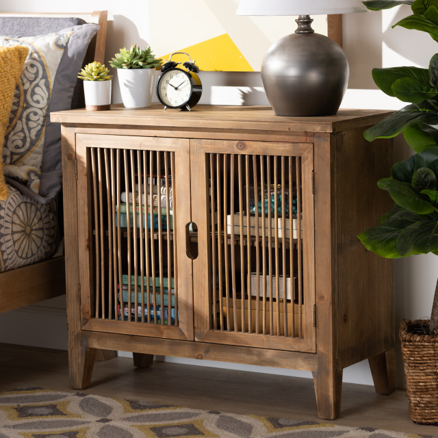 Clement Rustic Medium Oak Finished 2-Door Wood Spindle Accent Storage ...