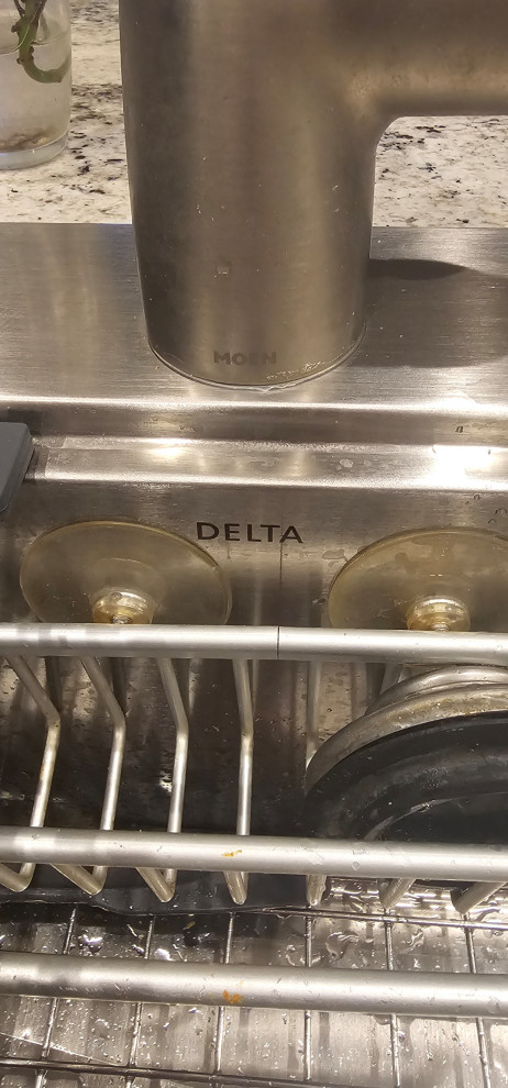 Moen faucet on a Delta sink