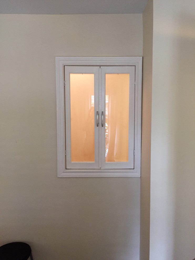 How to cover a peek a boo window?