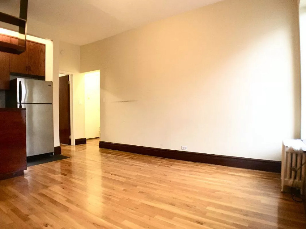 Small Open Space Exposed Brick Living Room with Awkward Wall Niche