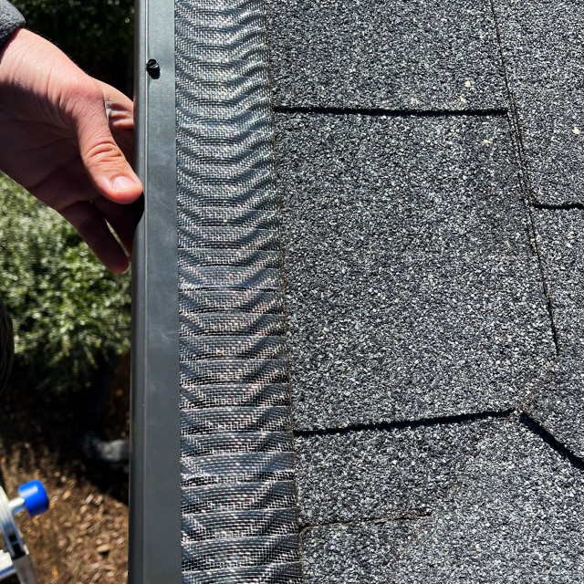 Professional installation of our gutter guard system on your home ...