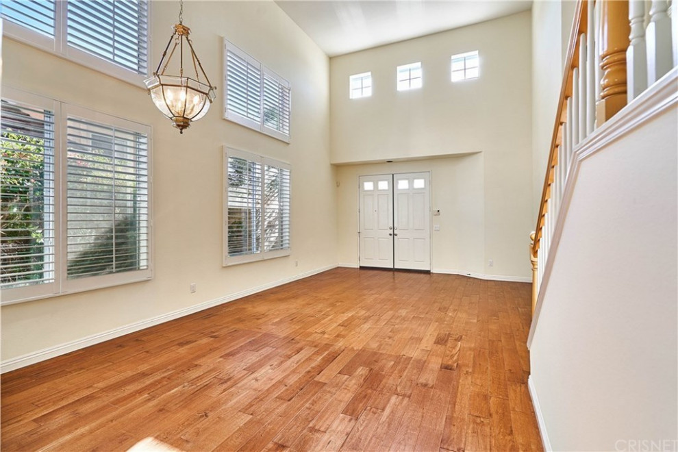 Front door opens into living room and dining room combo