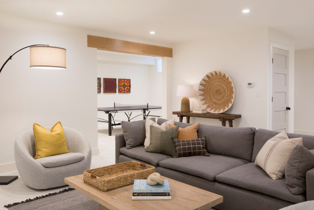 Shiplap, Oak Accents and Layers of Light Warm a Basement Design