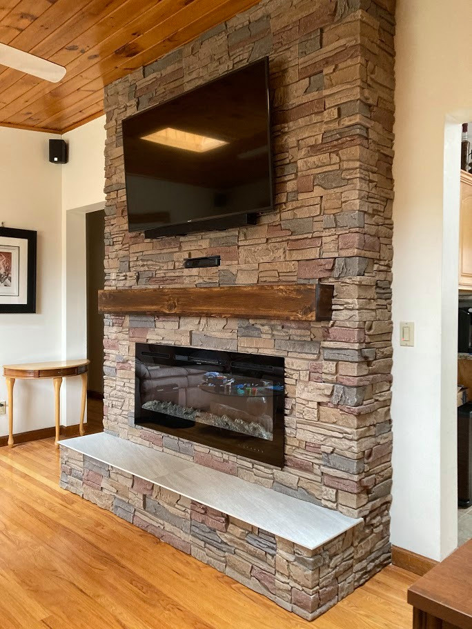 Desert Sunrise Stacked Stone Linear Fireplace Surround - Living Room ...