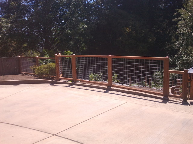 Terraced rock walls and hog wire fence - Rustic - Seattle - by Erin ...