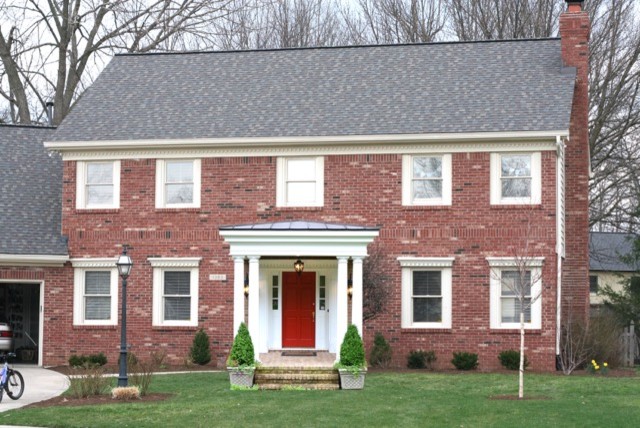 Portico design for a brick colonial.