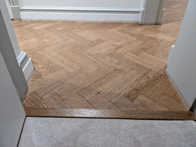 Aged effect herringbone parquet and traditional stair cladding ...