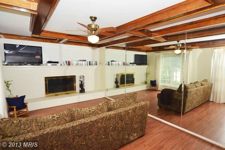 How to paint dark den with wood beams