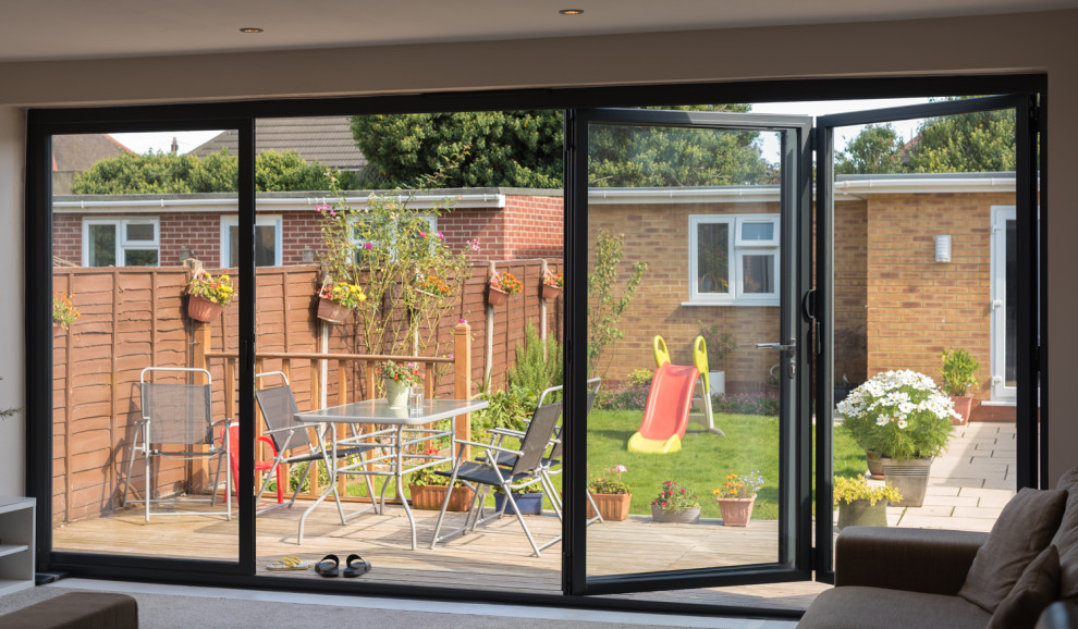 The Origin Slimline OB-49 Bi-fold Door helps fill this home with ...