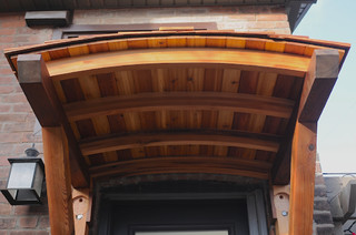 Curved cedar awning - Craftsman - Toronto - by Brendan Fenn