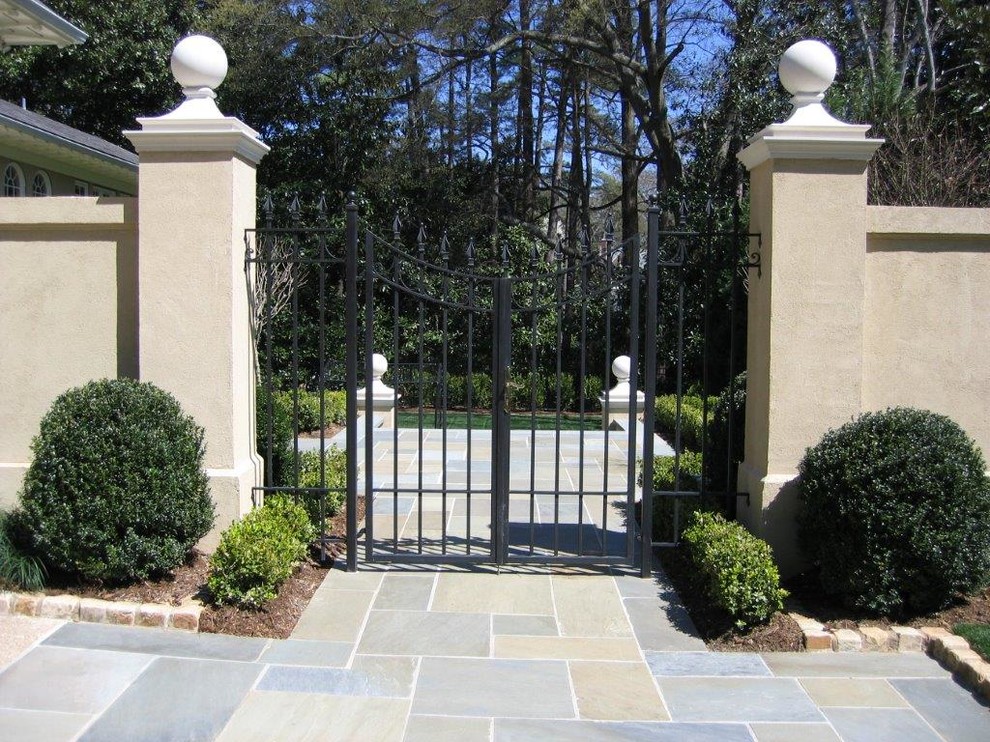 Wrought Iron Backyard gates features Stucco columns and walls with ...