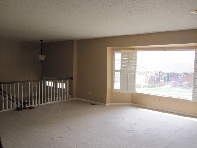 Any ideas for how to update this circa 70s split level living room?