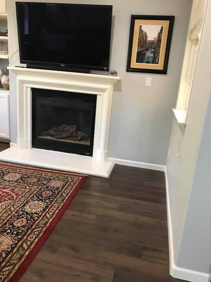 What to put next to fireplace, under window!