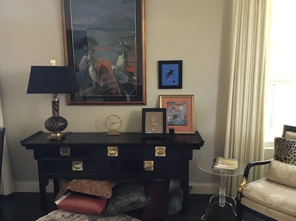 Can someone help me tone down too formal living room with poor layout?