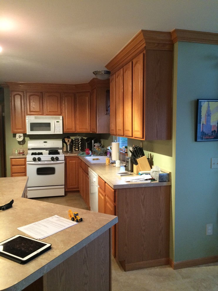 What to do about oak crown molding and fireplace