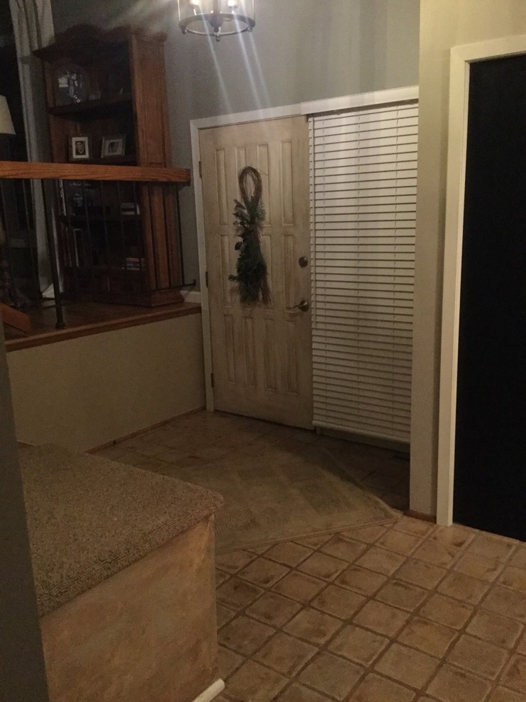 Redesign stairs to eliminate awkward landing in entry.