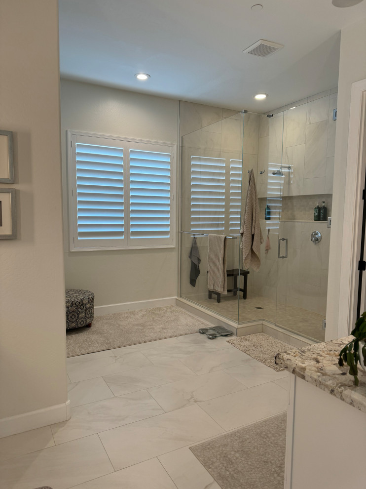 Help with off center window in master bath.