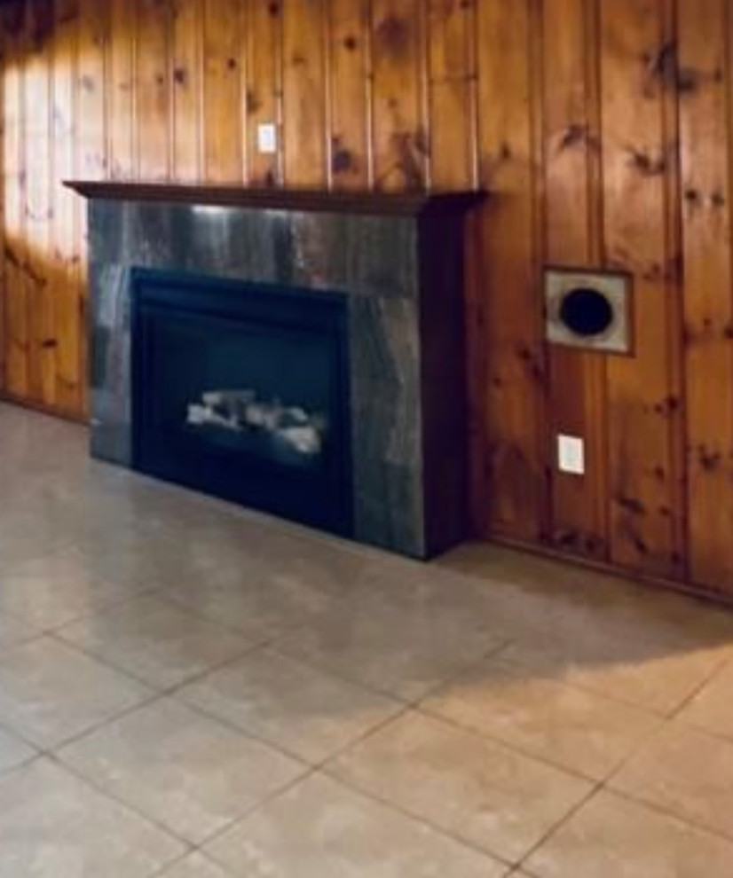What the heck is this hole next to the fireplace?