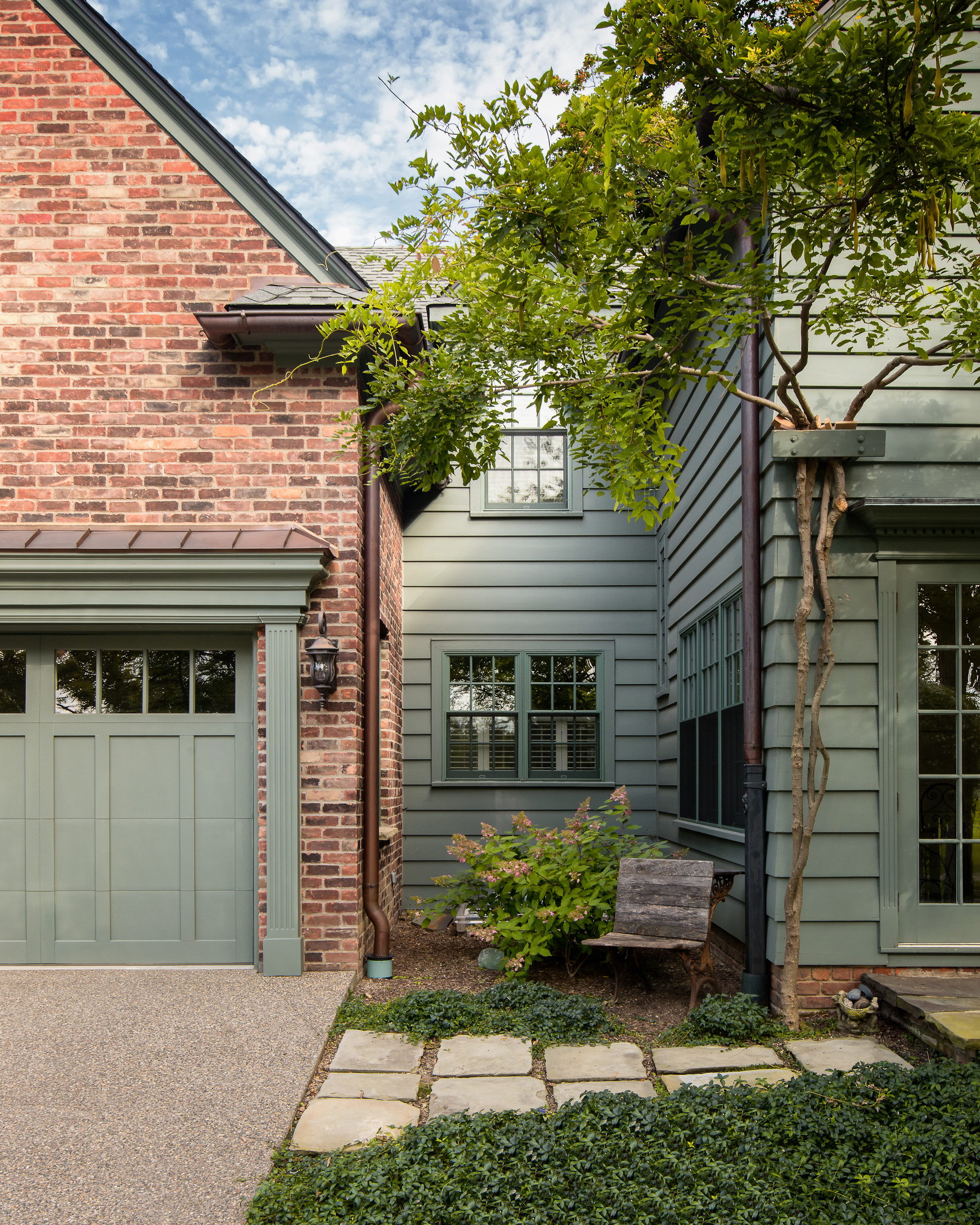 How to Make Your Brick House Feel at Home in the Landscape