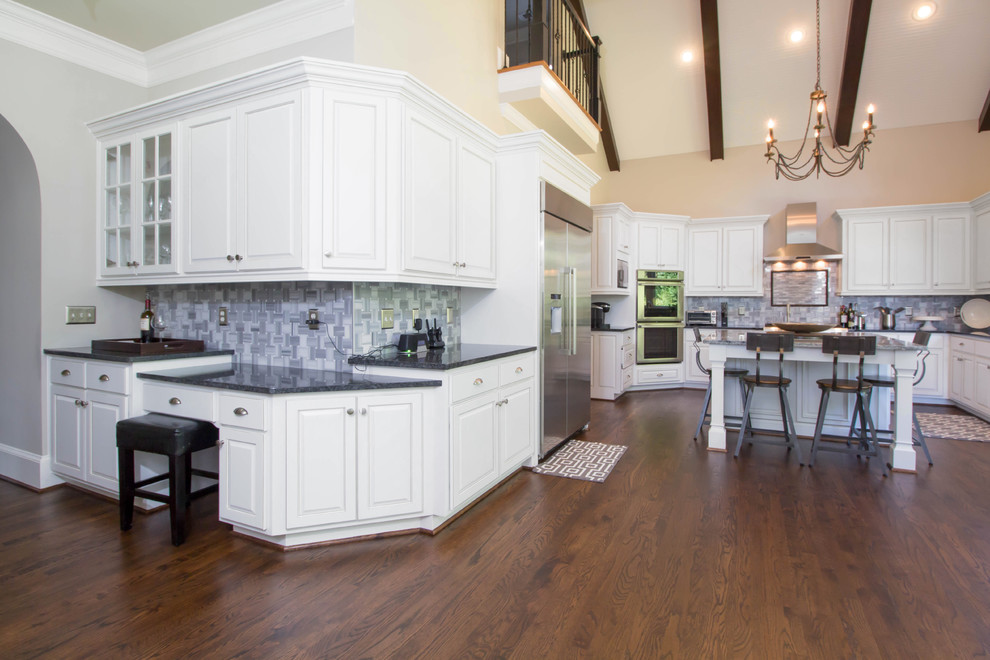 Here is a great example of opening up a kitchen with paint!