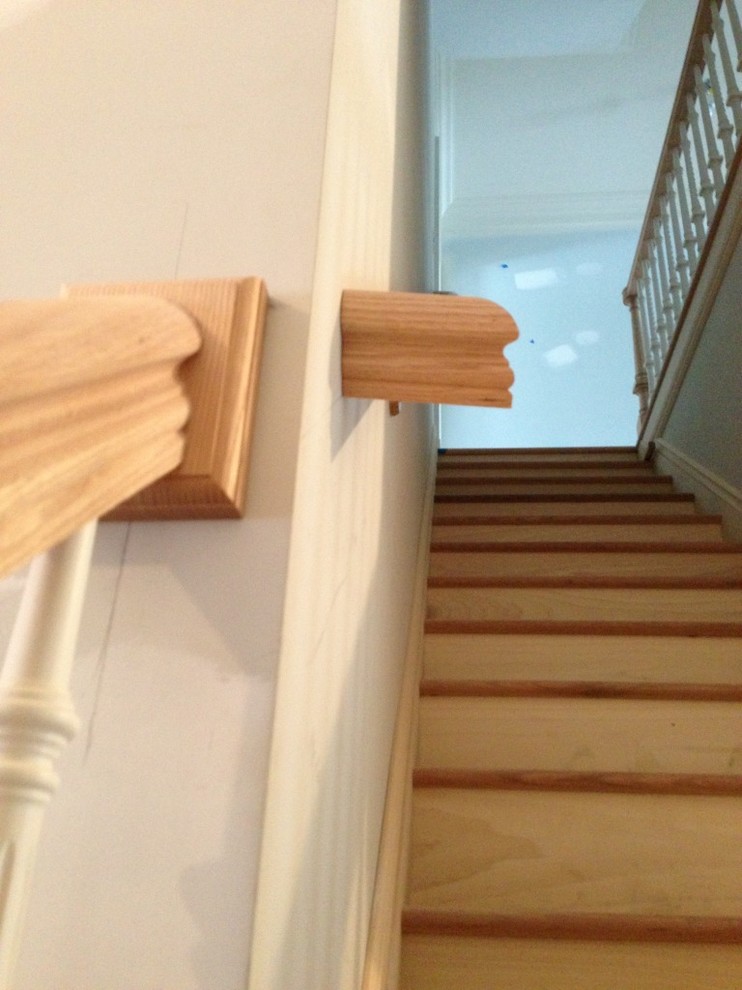 2 different style handrails on 1 staircase?