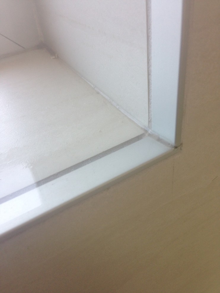 Mitered edge or Schluter Edge: What's better for a shower window sill