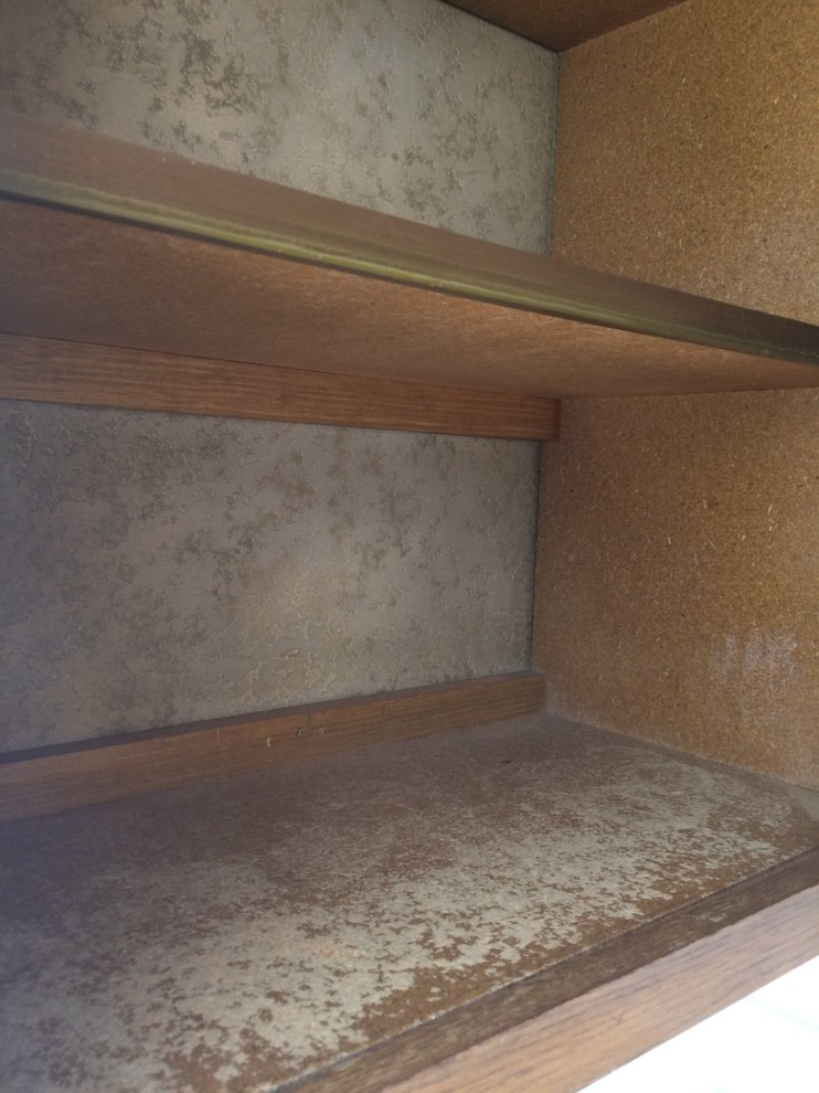 Inside of kitchen cabinets -- no backs!