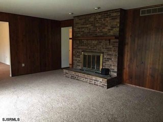 Can this 80s era paneling be whitewashed?