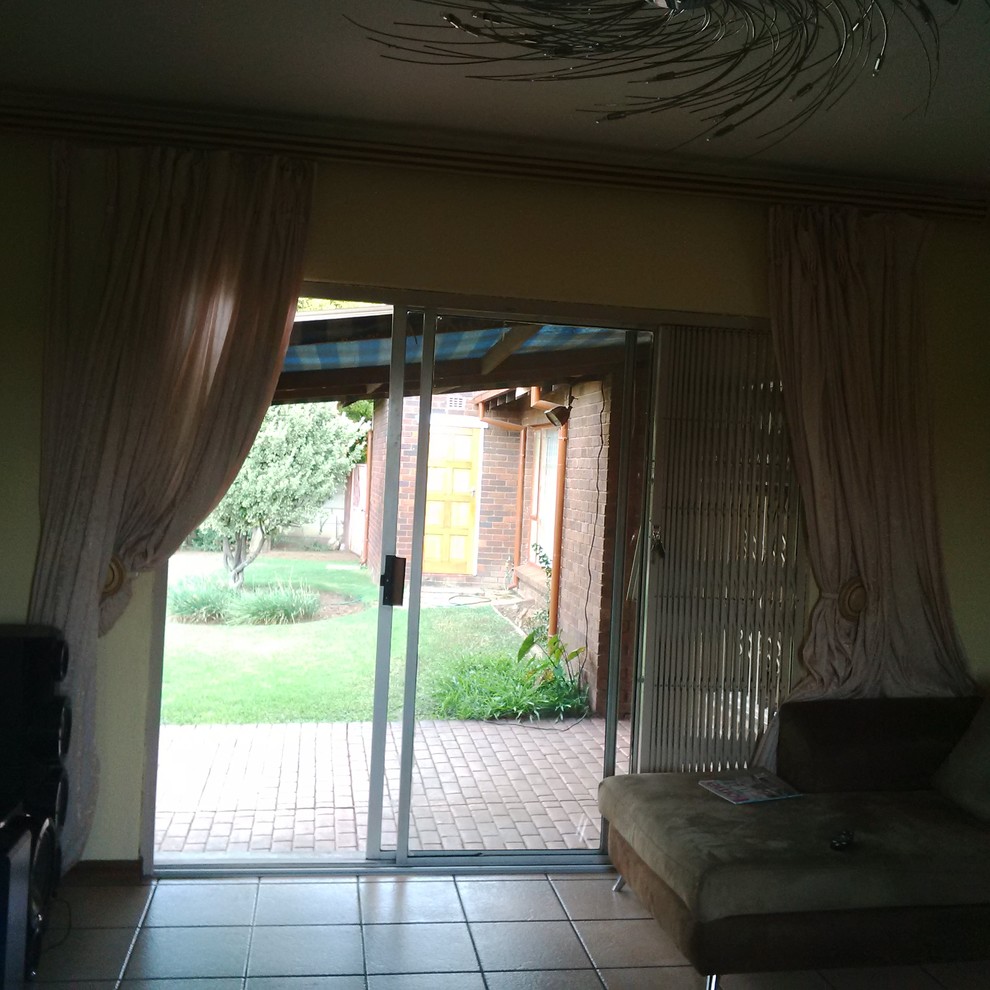 help me with my living room. too manydoors and windows